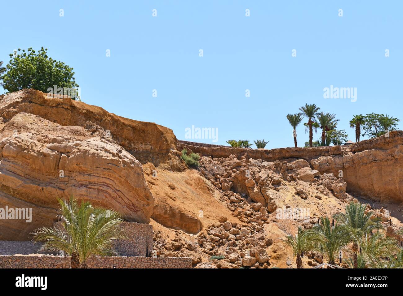 Rock collapse on the beach. Collapsed rock, blocked on visiting the ...