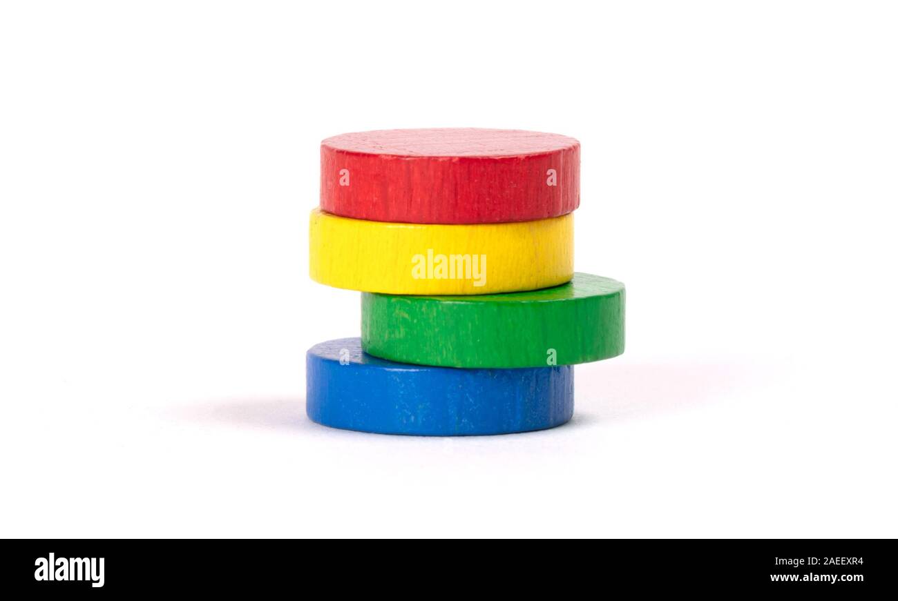 Circular wooden chips of different colors, red, green, blue, yellow for ...