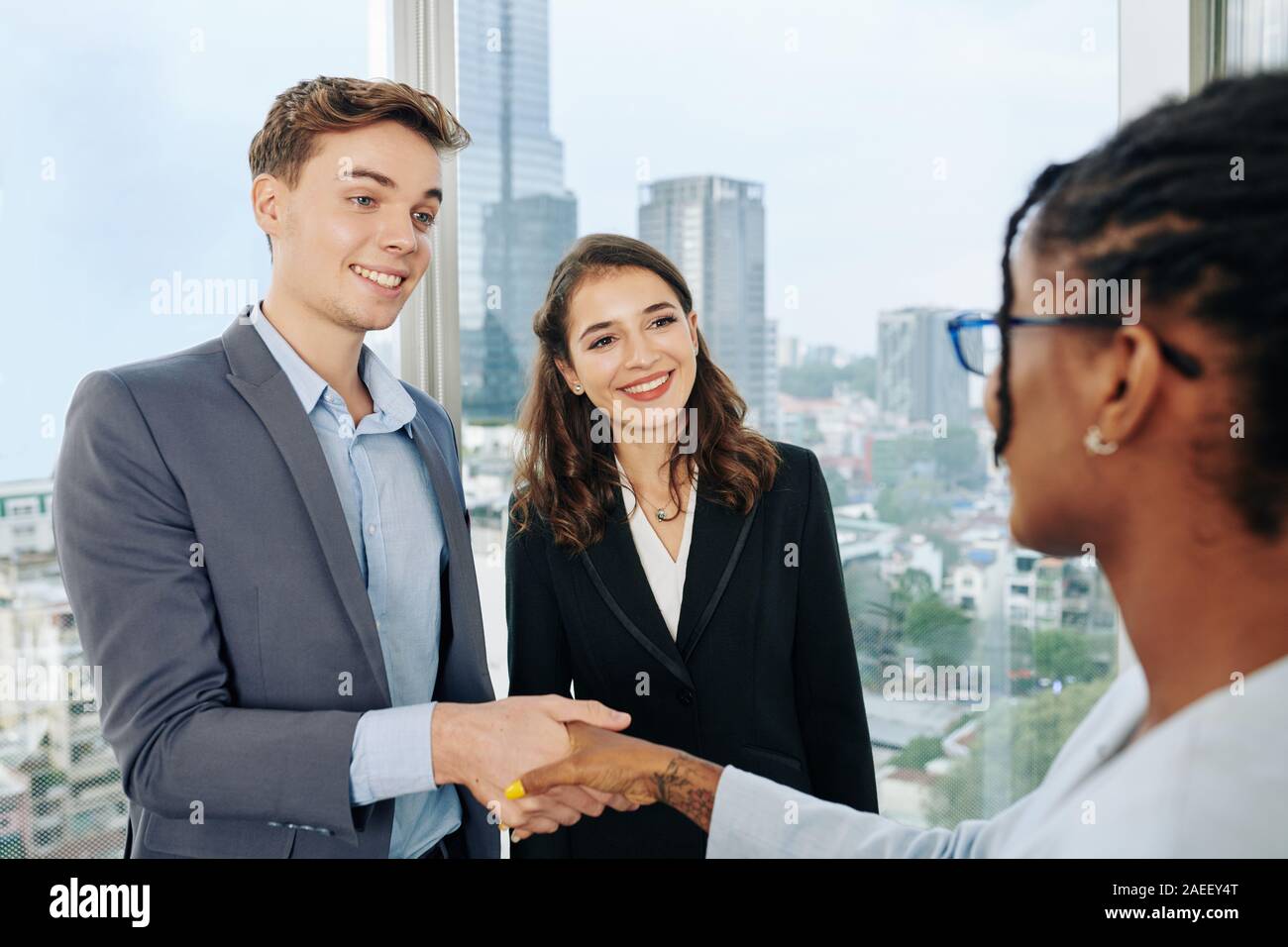 Cheerful east asian coworker hi-res stock photography and images - Alamy