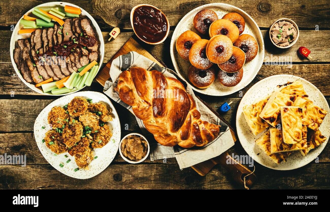 Selection of traditional hanukkah food for festive dinner, wood ...