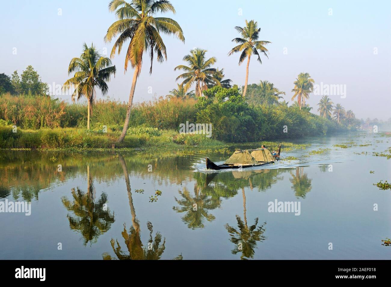 Transportation of sand in country boat, Kuttanad, Kumarakom, Kerala ...
