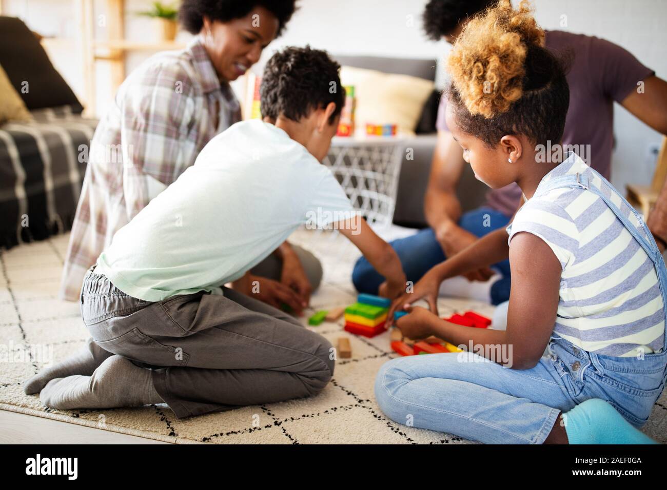 Happy black family having fun times at home Stock Photo - Alamy Happy black family having fun times at home Stock Photo - Alamy