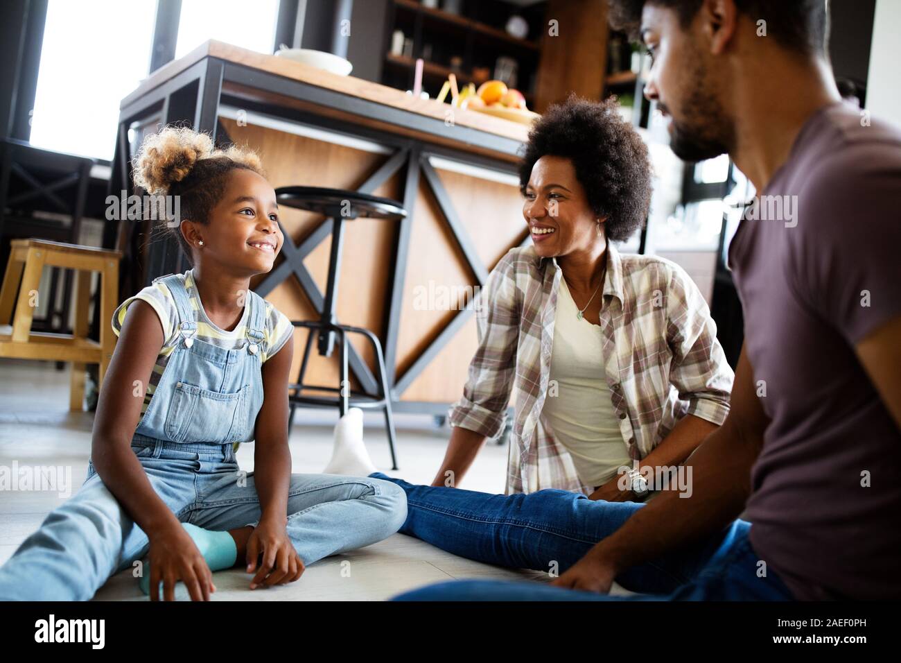 Child talking to adult happy hi-res stock photography and images - Alamy