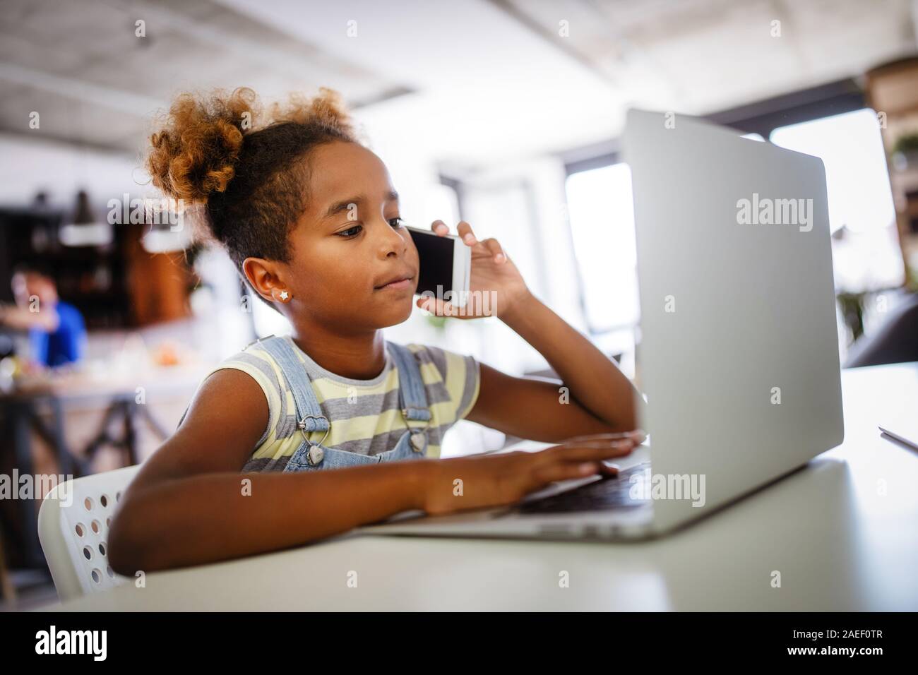 Game, study, fun concept. Happy children spending time with notebook ...