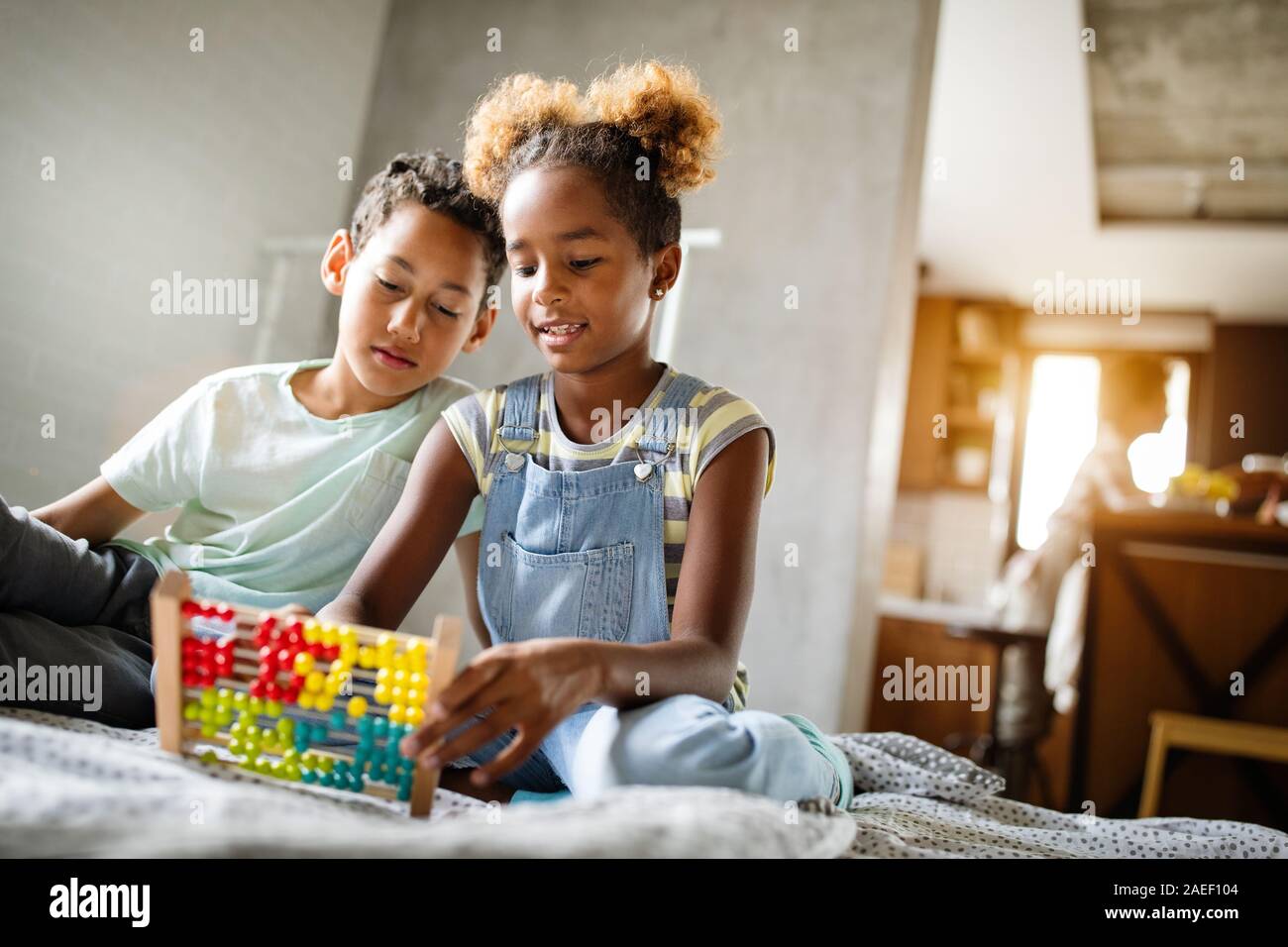 Children, education, plyaing happiness concept. Happy kids entertaining ...