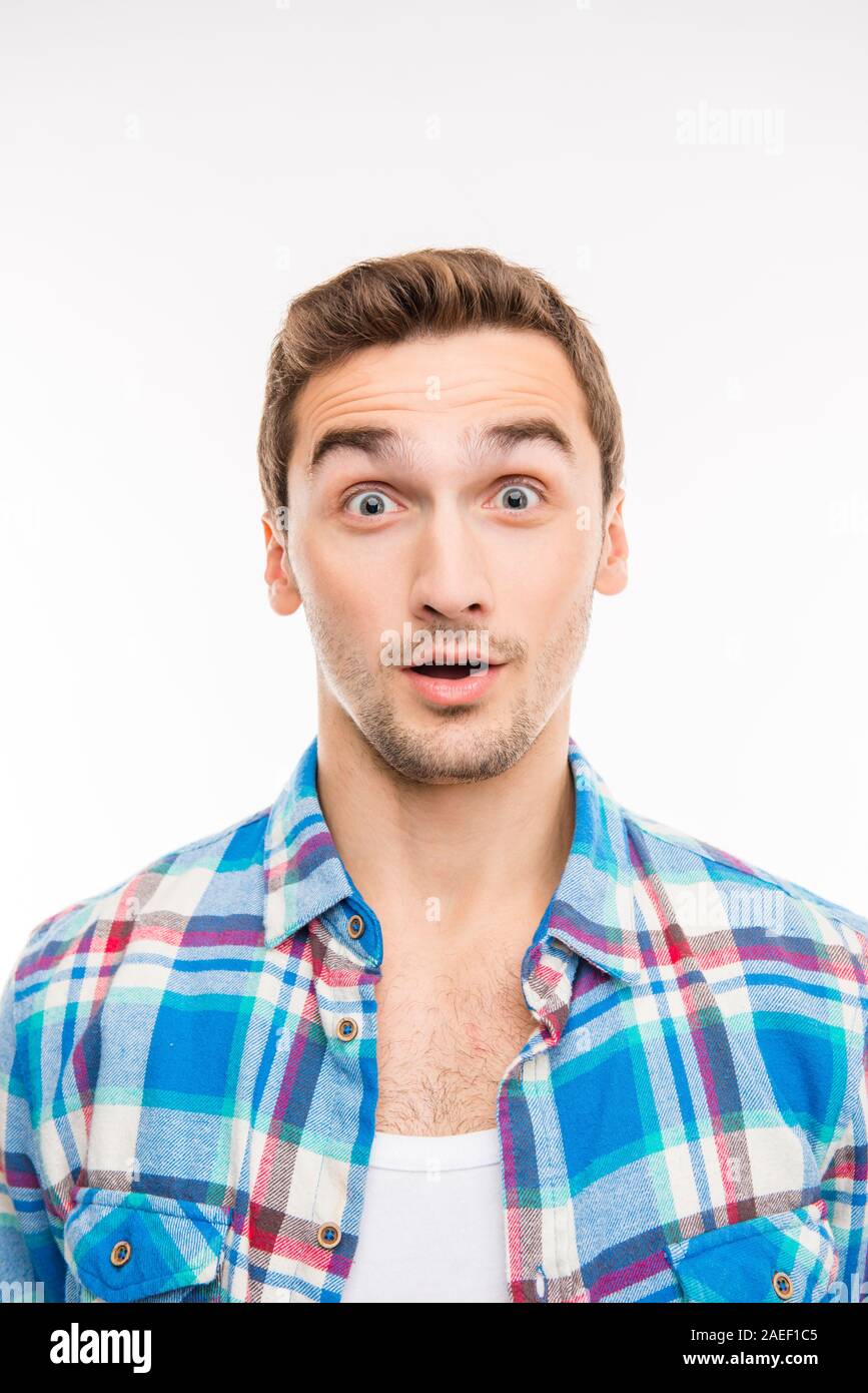 Photo of a surprised handsome young man Stock Photo - Alamy