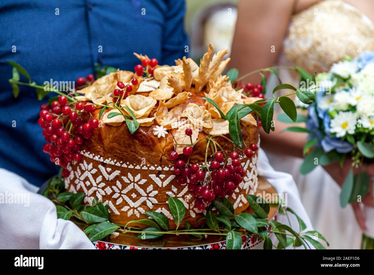 Traditional Ukrainian handmade bread decorated by guelder rose and ...