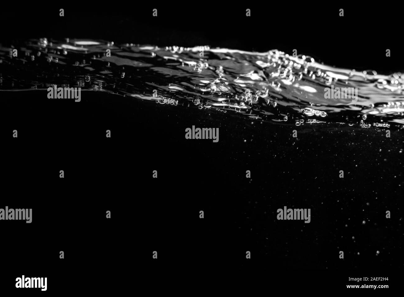 The shape of water in a dark Stock Photo - Alamy