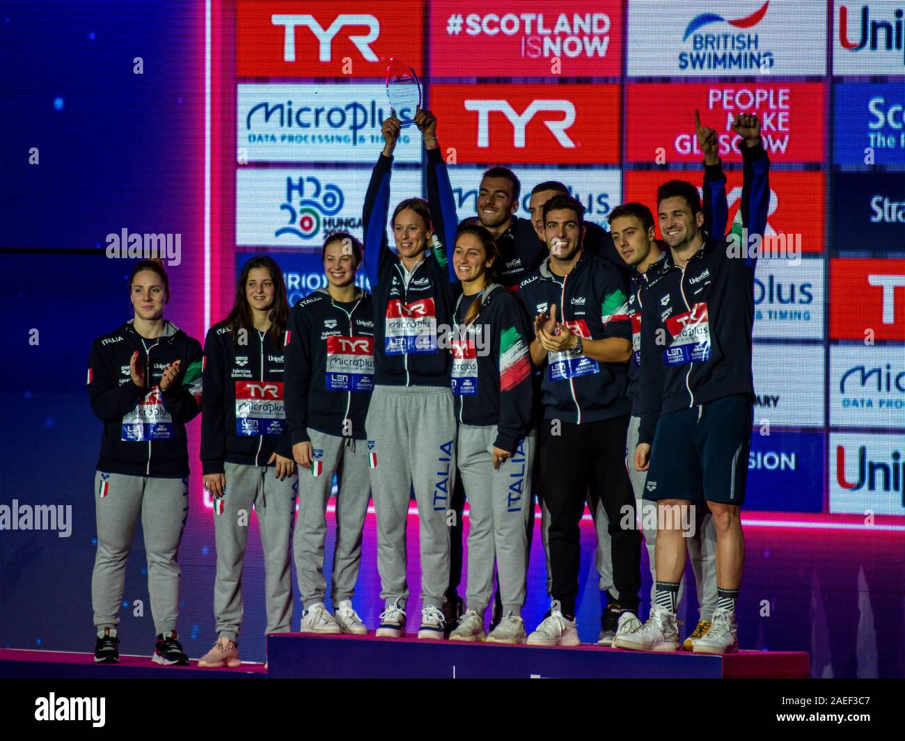Glasgow, UK. 08th Dec, 2019. The Italian swim team celebrate on the ...