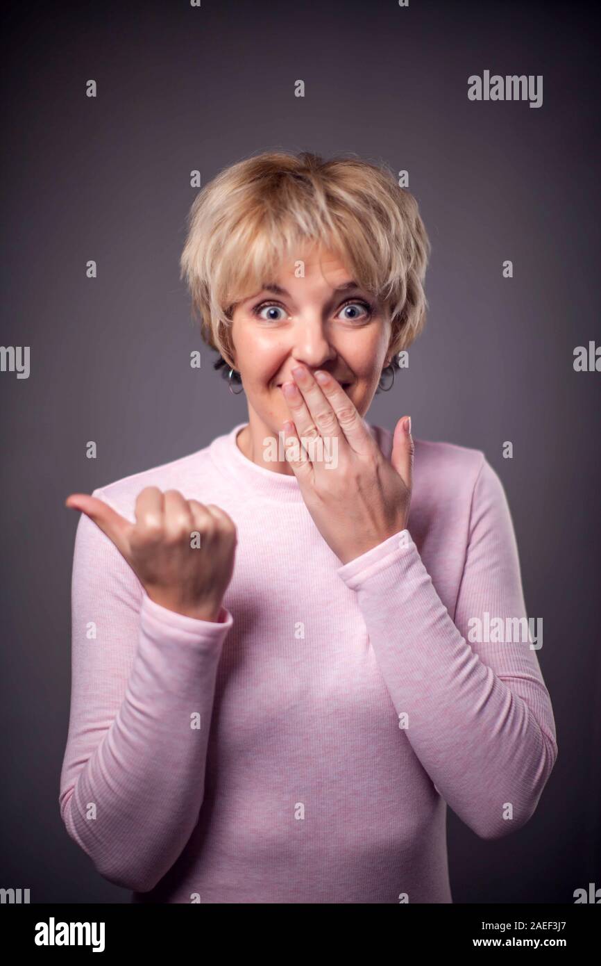 Female showing fingers on something. People and emotion concept Stock ...