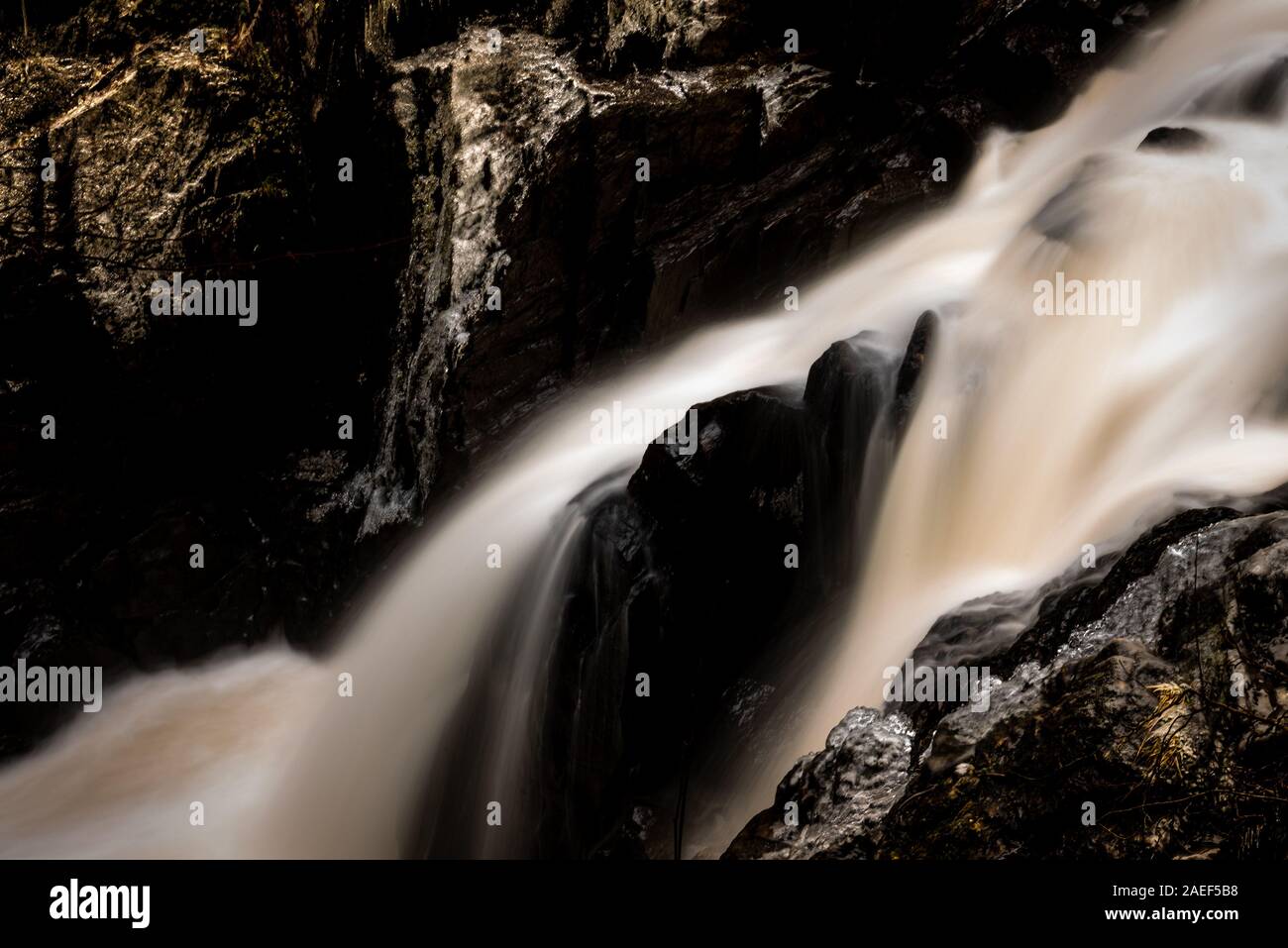 Frozen stones in Highland river Stock Photo - Alamy