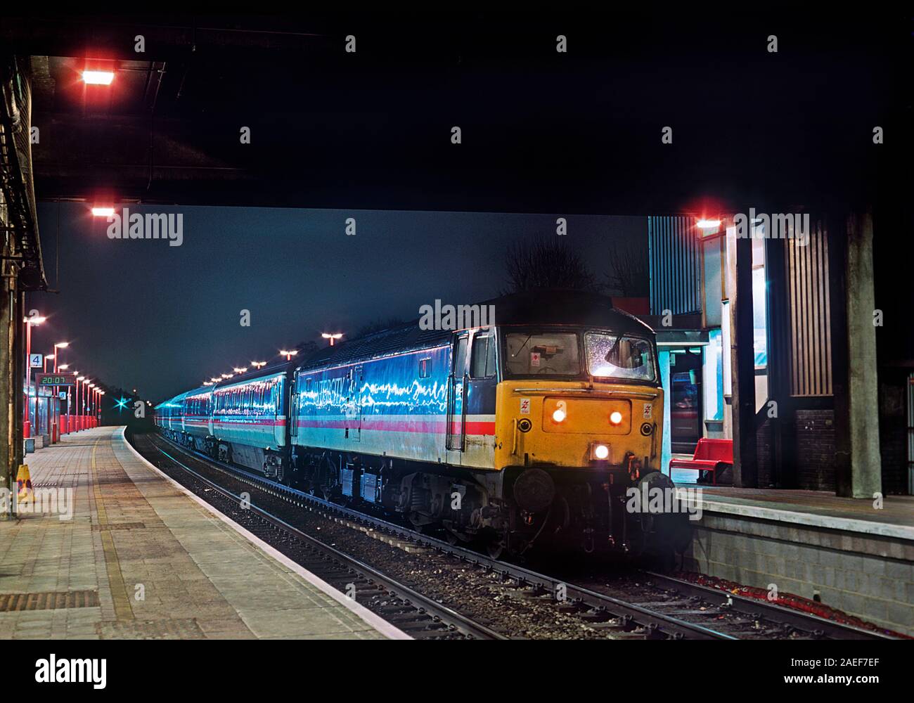 A class 47 diesel locomotive number 47847 pauses at Ealing broadway ...