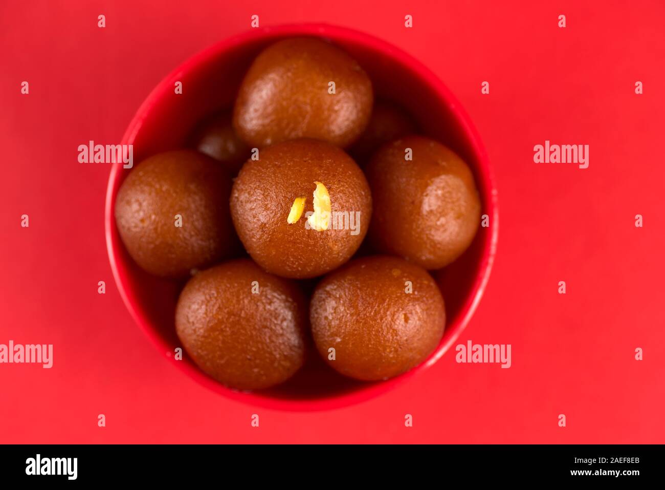 Gulab Jamun in red bowl on red background. Indian Dessert or Sweet Dish ...
