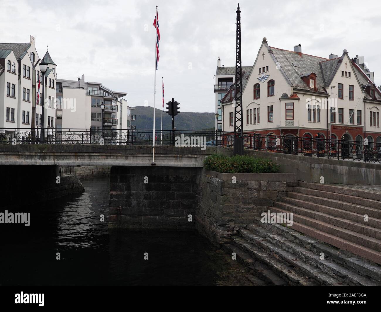 Bridge and secessionist houses in european Alesund town at square in ...