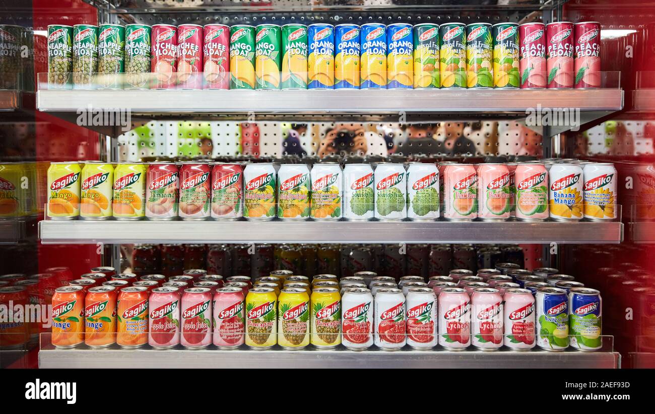 COLOGNE, OCTOBER 2019: Many fruit juice beverage cans at the ANUGA food ...