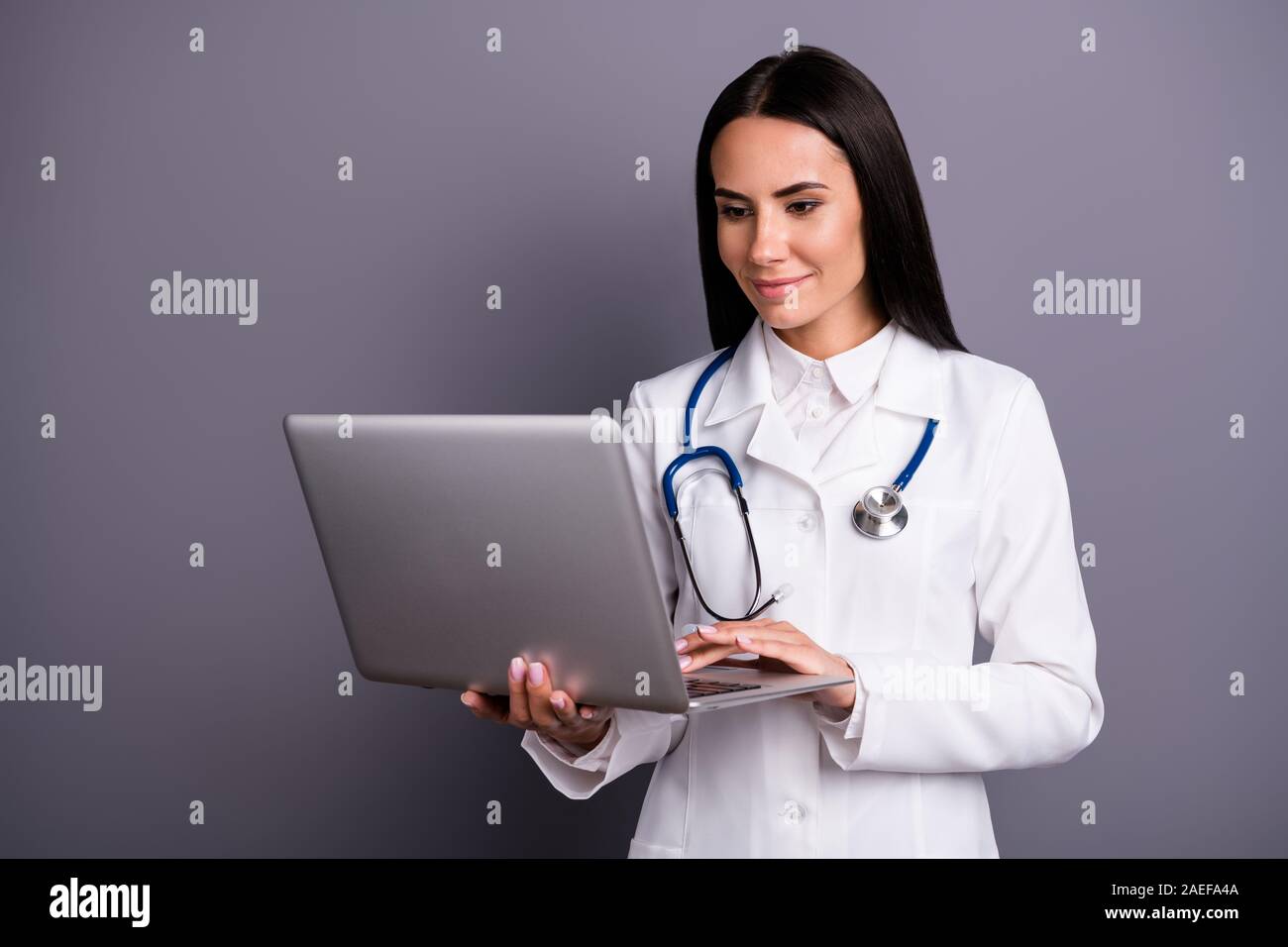 Portrait of concentrated successful brown hair doctor woman have ...
