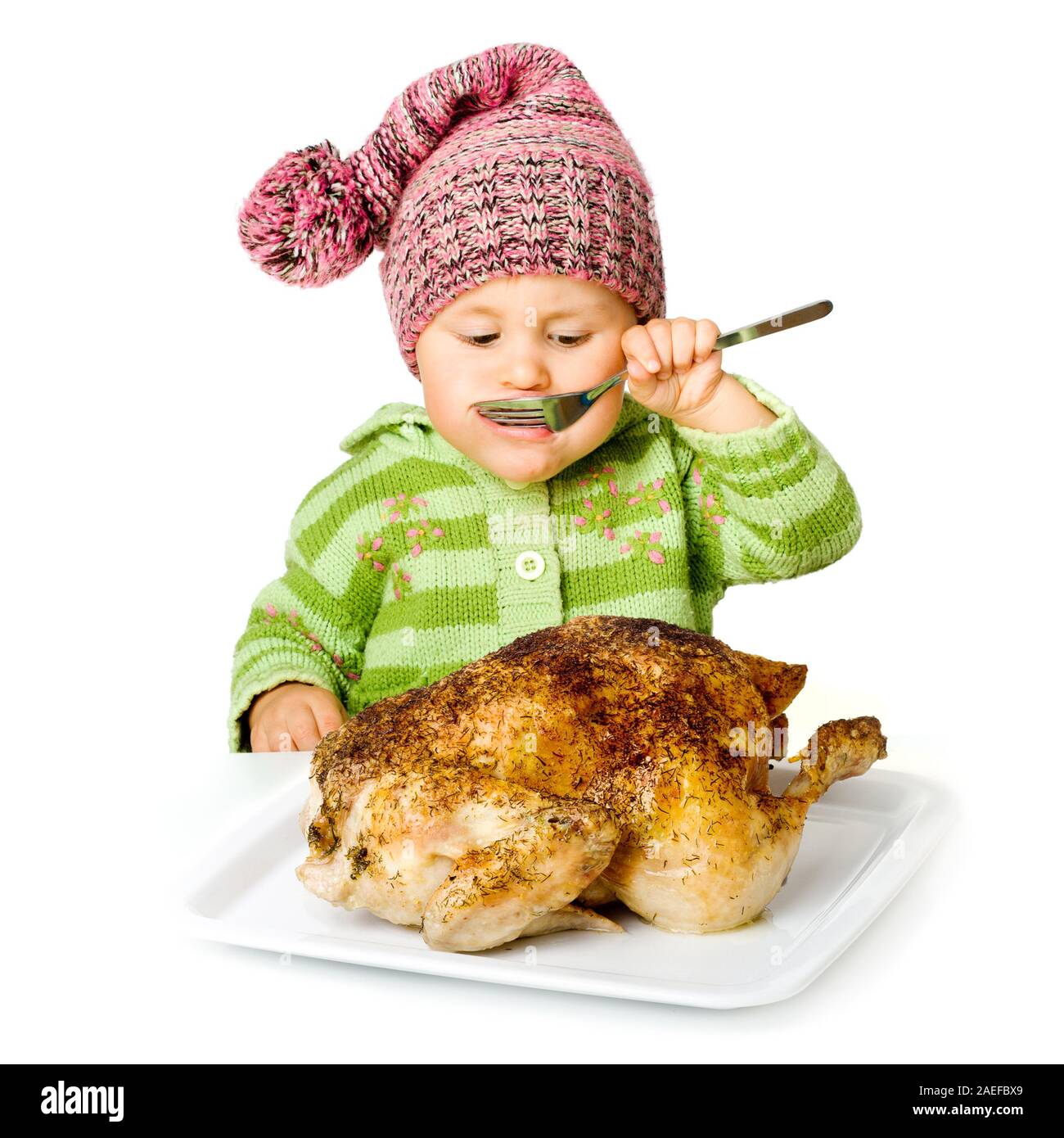 Funny child eating tasty turkey, isolated over white Stock Photo - Alamy
