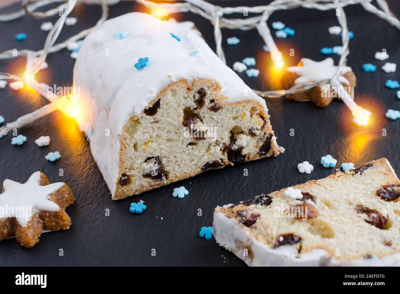 traditional german christmas cake stollen with cookies and decoration ...
