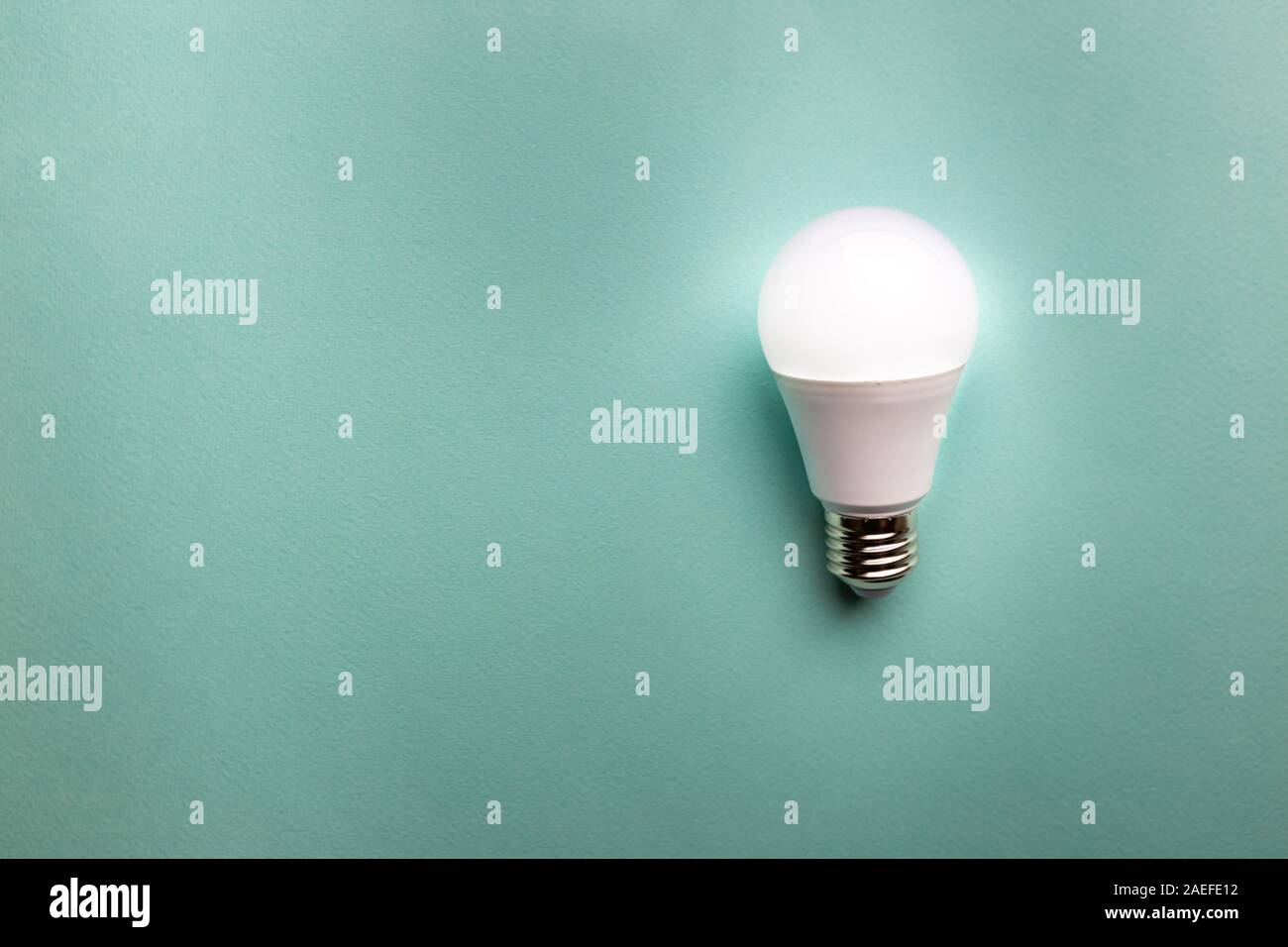 Creativity inspiration, ideas concepts with light bulb on blue color ...