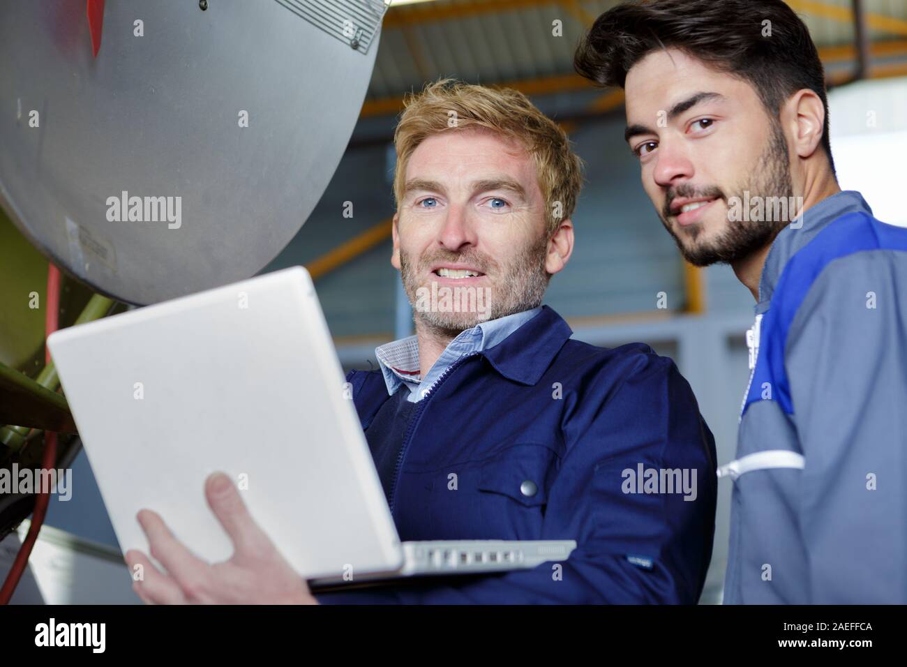 engineer and foreman in factory Stock Photo - Alamy