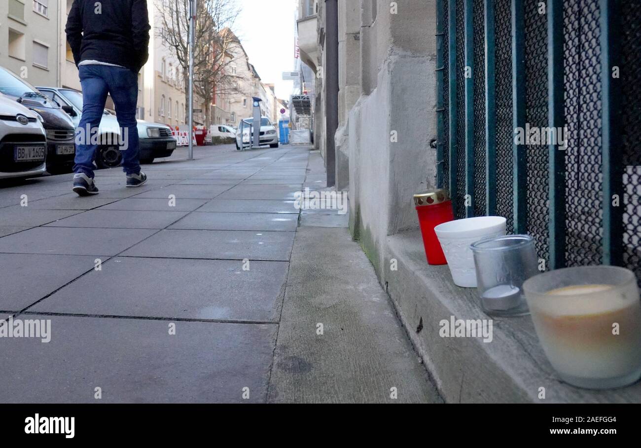 Stuttgart, Germany. 09th Dec, 2019. Candles are standing near a crime ...
