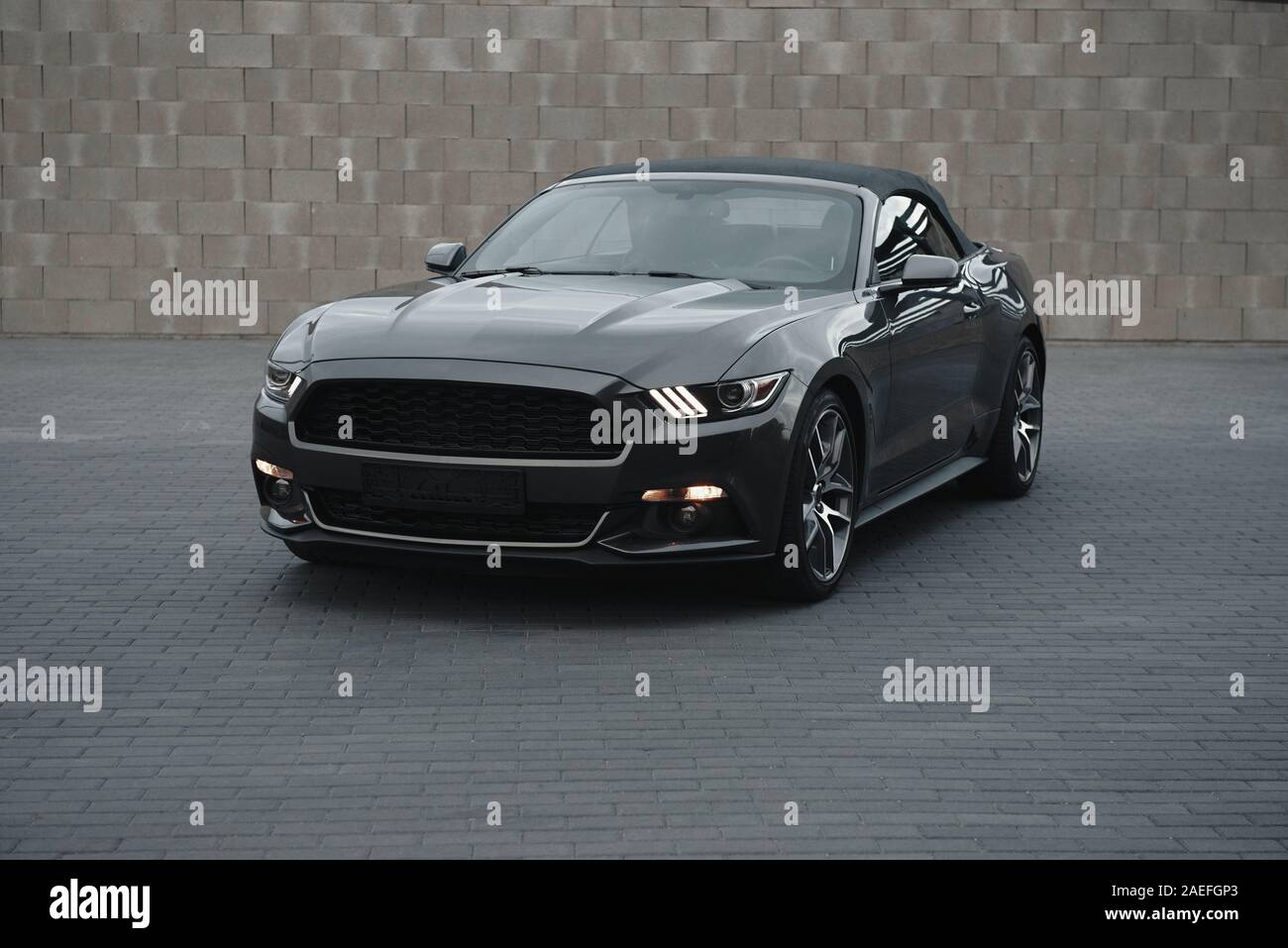 Gray american muscle car Ford Mustang GT with modifications standing ...
