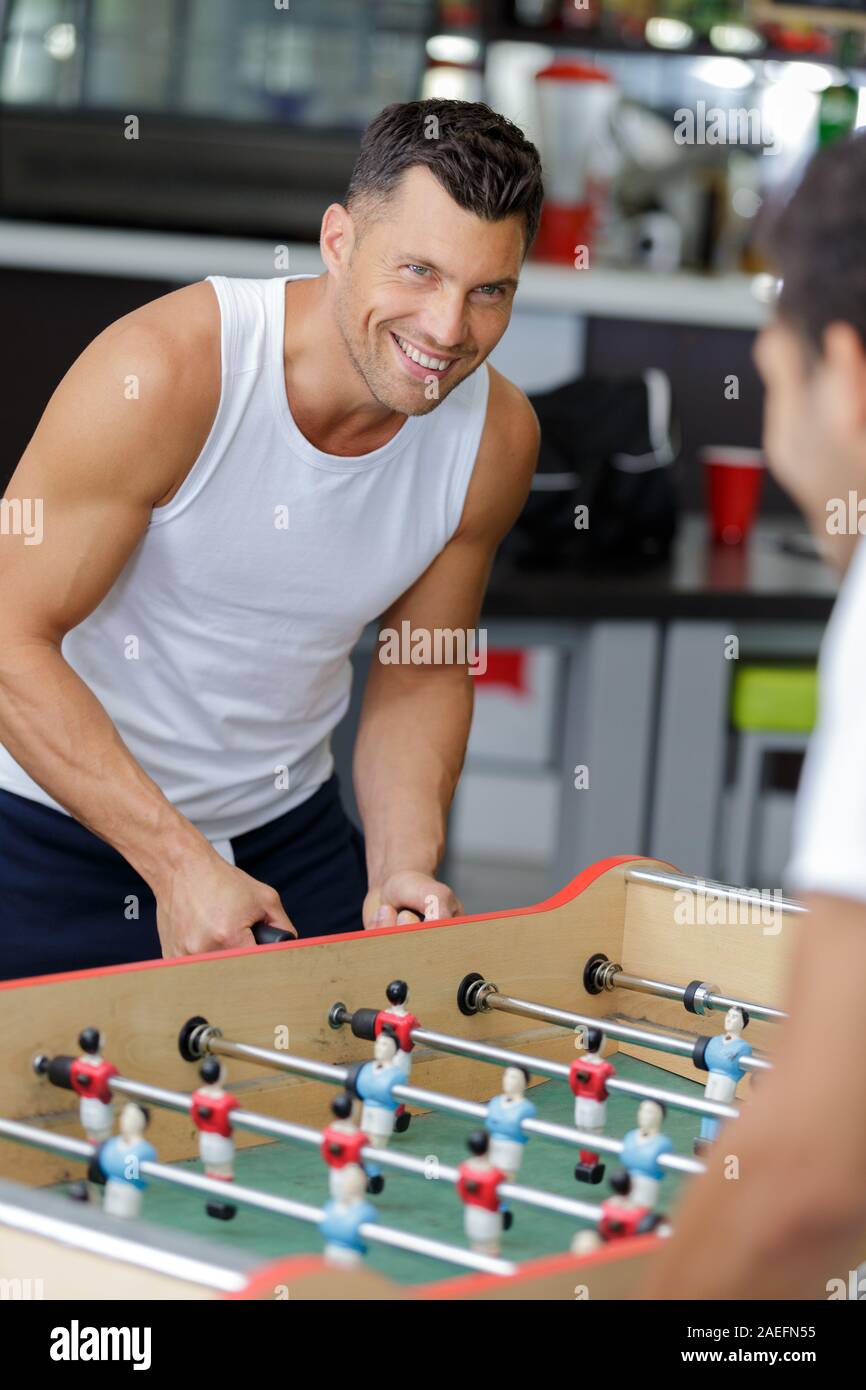 Playing football table hi-res stock photography and images - Alamy