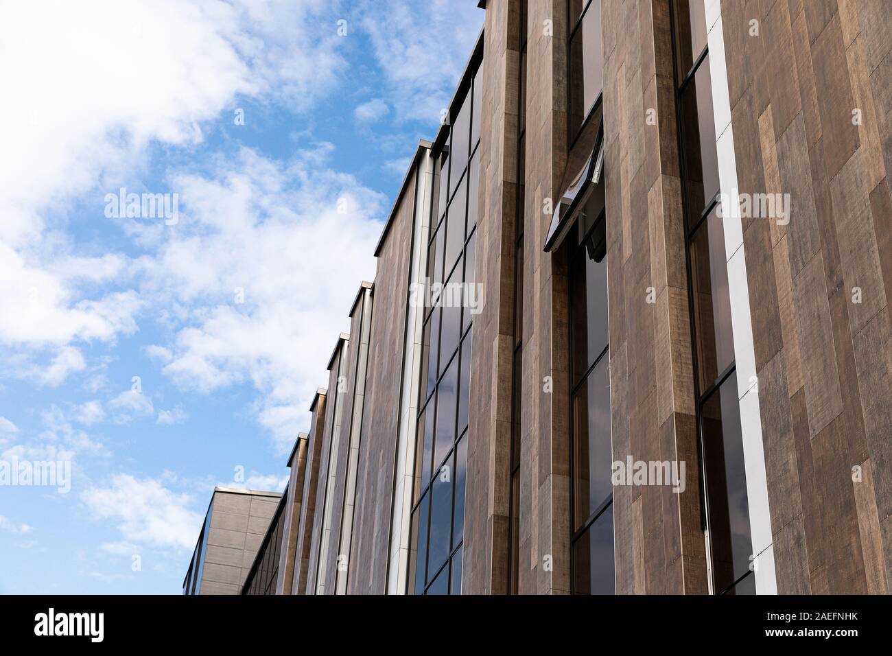 Tall office building on sky background Stock Photo - Alamy
