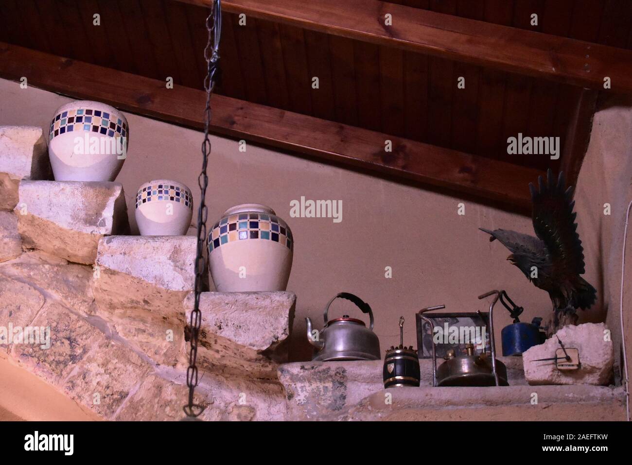 Ancient pots and kettle displayed inside of a Nazareth Cafe Stock Photo ...