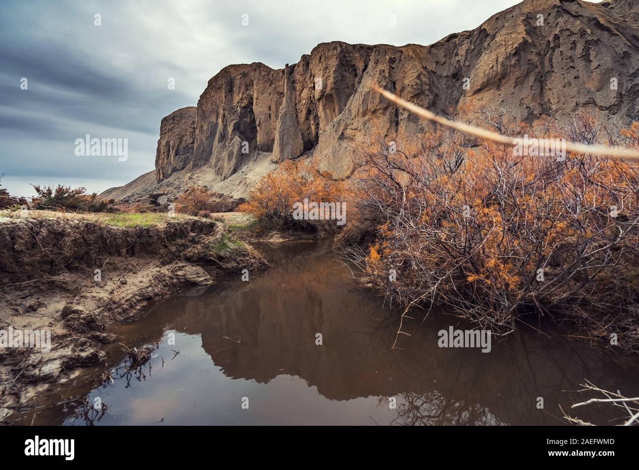 Small river in arid mountain terrain, atmospheric landscape Stock Photo ...