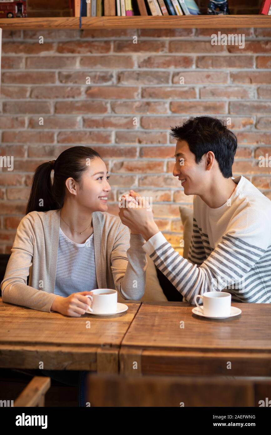 Young college couple coffee shop hi-res stock photography and images ...