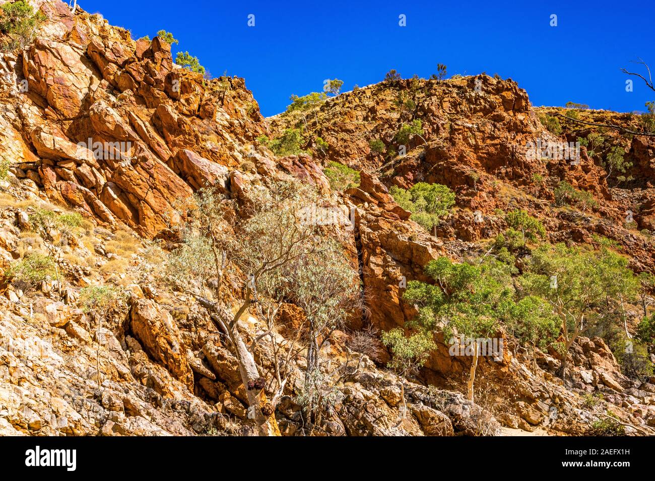 The colourful Redbank Gorge is a gap in the West MacDonnell Ranges in ...