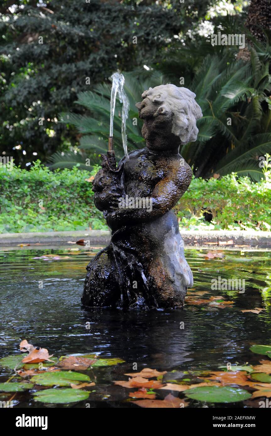 Fountain in the Triton Pond at La Concepcion Historical Botanical ...