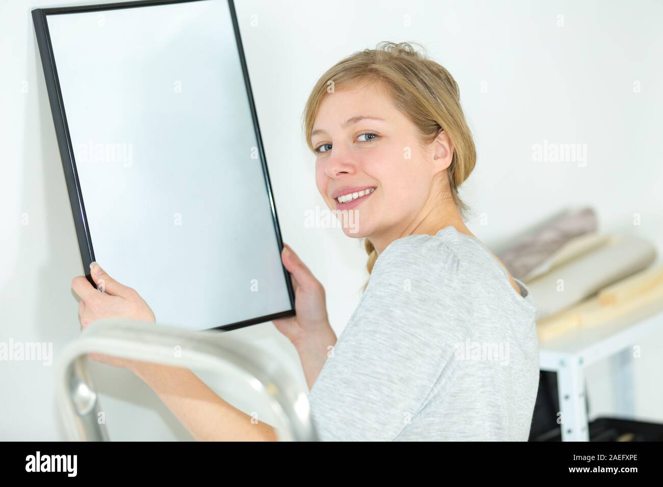 a woman framing a picture Stock Photo - Alamy