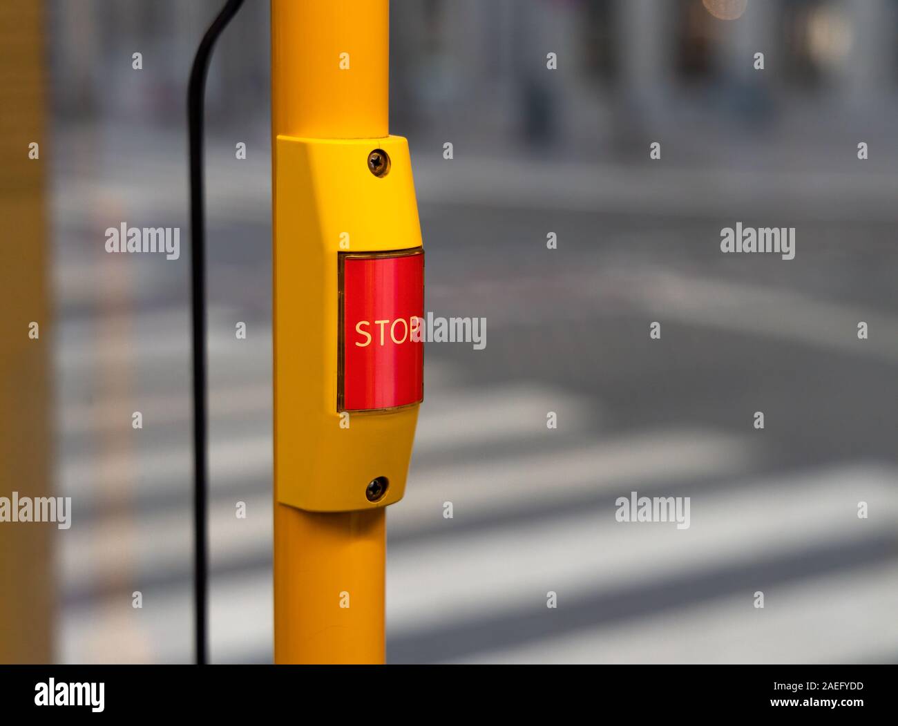 Stop button on city bus Stock Photo - Alamy
