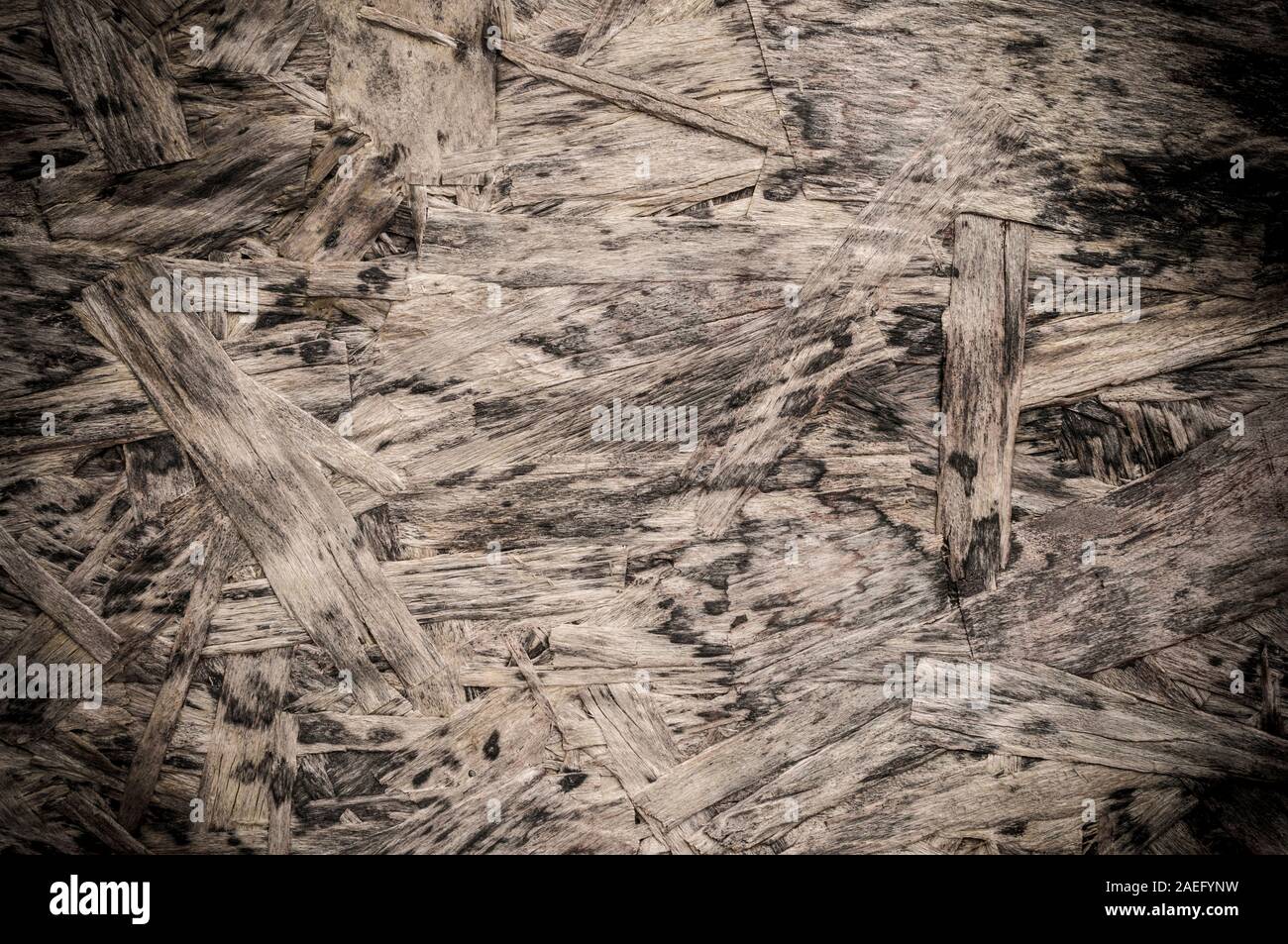 Osb wood grunge texture with black vignette Stock Photo - Alamy