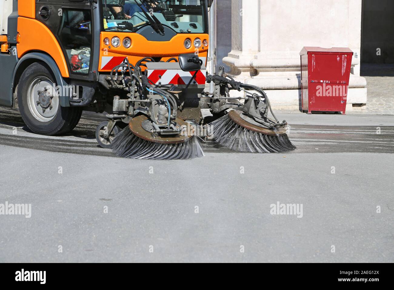 front sweeper cleaning a square in Salzburg Stock Photo - Alamy