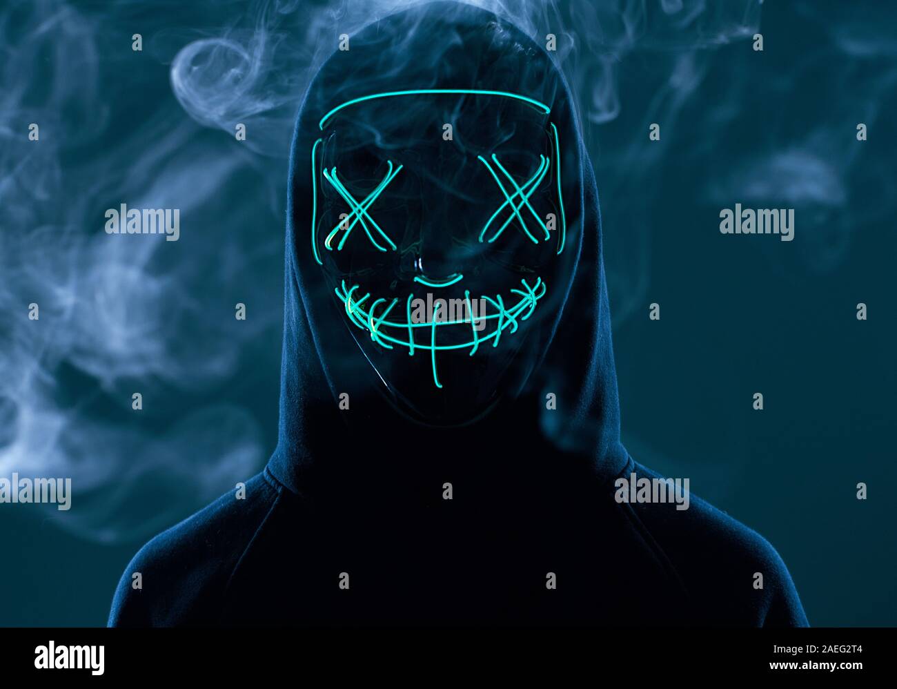 Black man hiding identity behind mask hi-res stock photography and ...