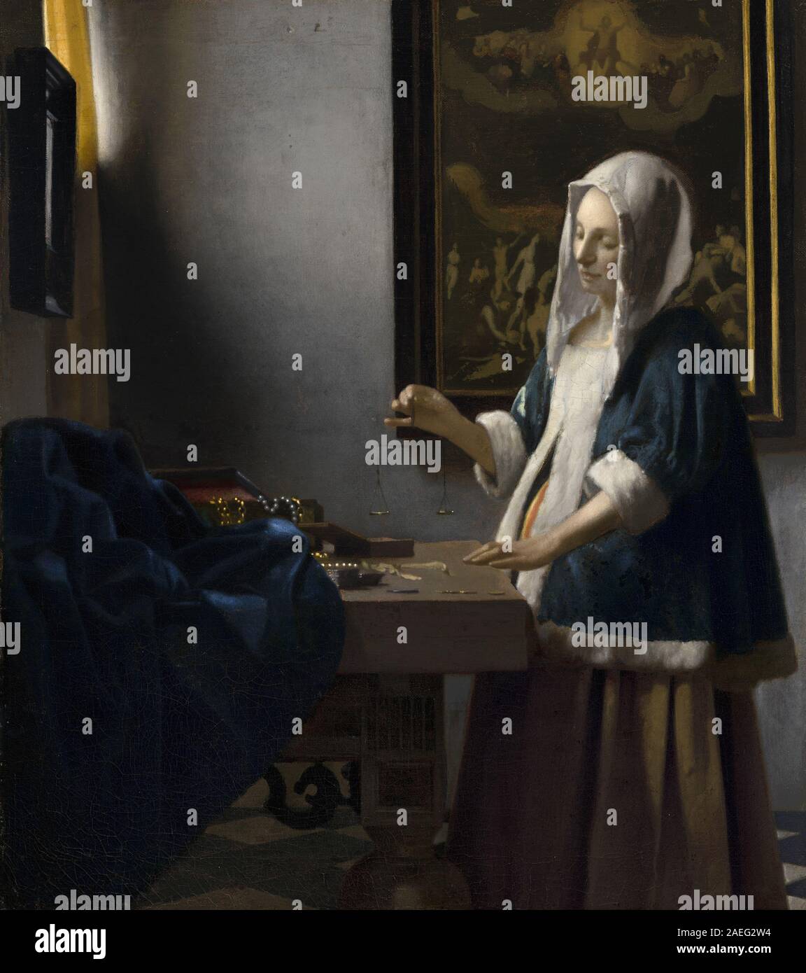 Woman holding a balance vermeer hi-res stock photography and images - Alamy