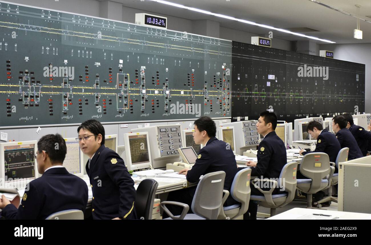 A disaster drill is conducted at an operation center in Osaka for ...