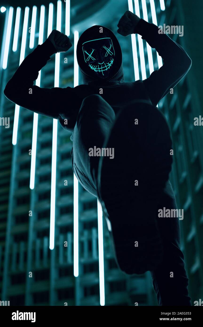 Bright young people hiding in hi-res stock photography and images - Alamy