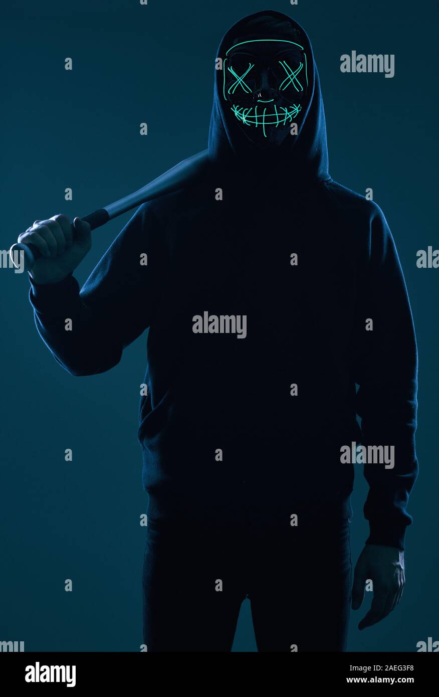 Black man hiding identity behind mask hi-res stock photography and ...