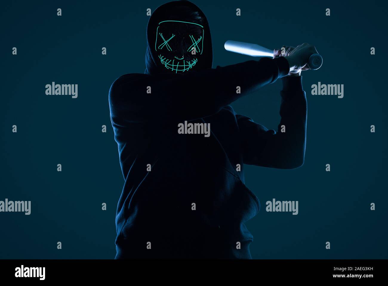 Black man hiding identity behind mask hi-res stock photography and ...