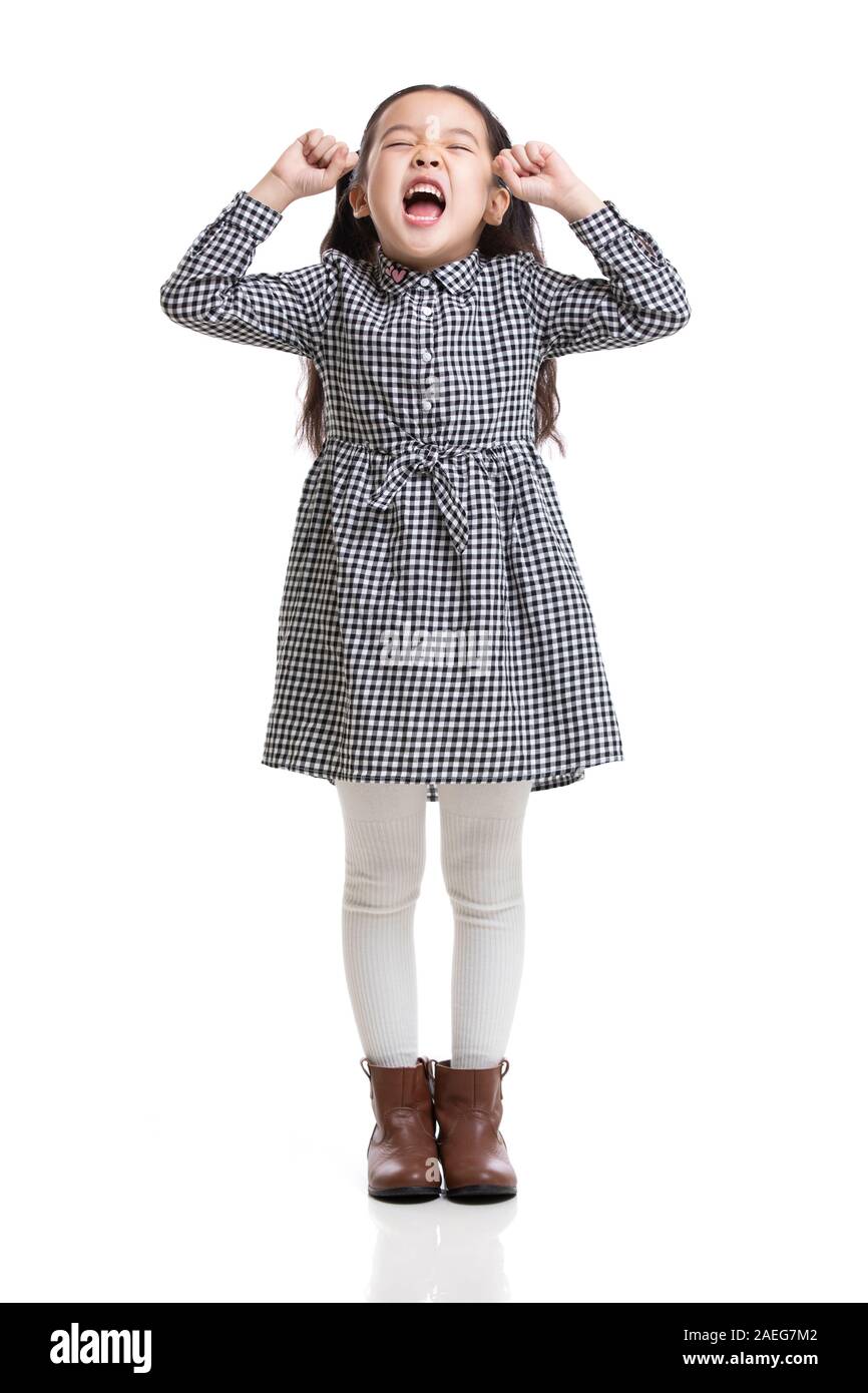 Lovely little girl making a face Stock Photo - Alamy