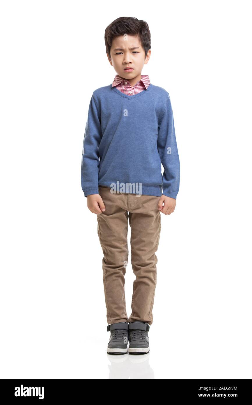 Little boy frowning Stock Photo - Alamy