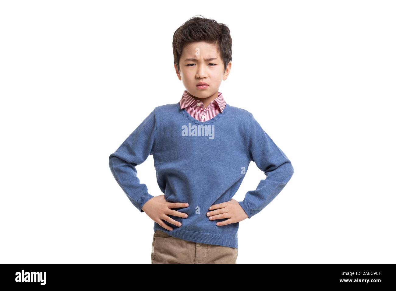 Little boy frowning Stock Photo - Alamy