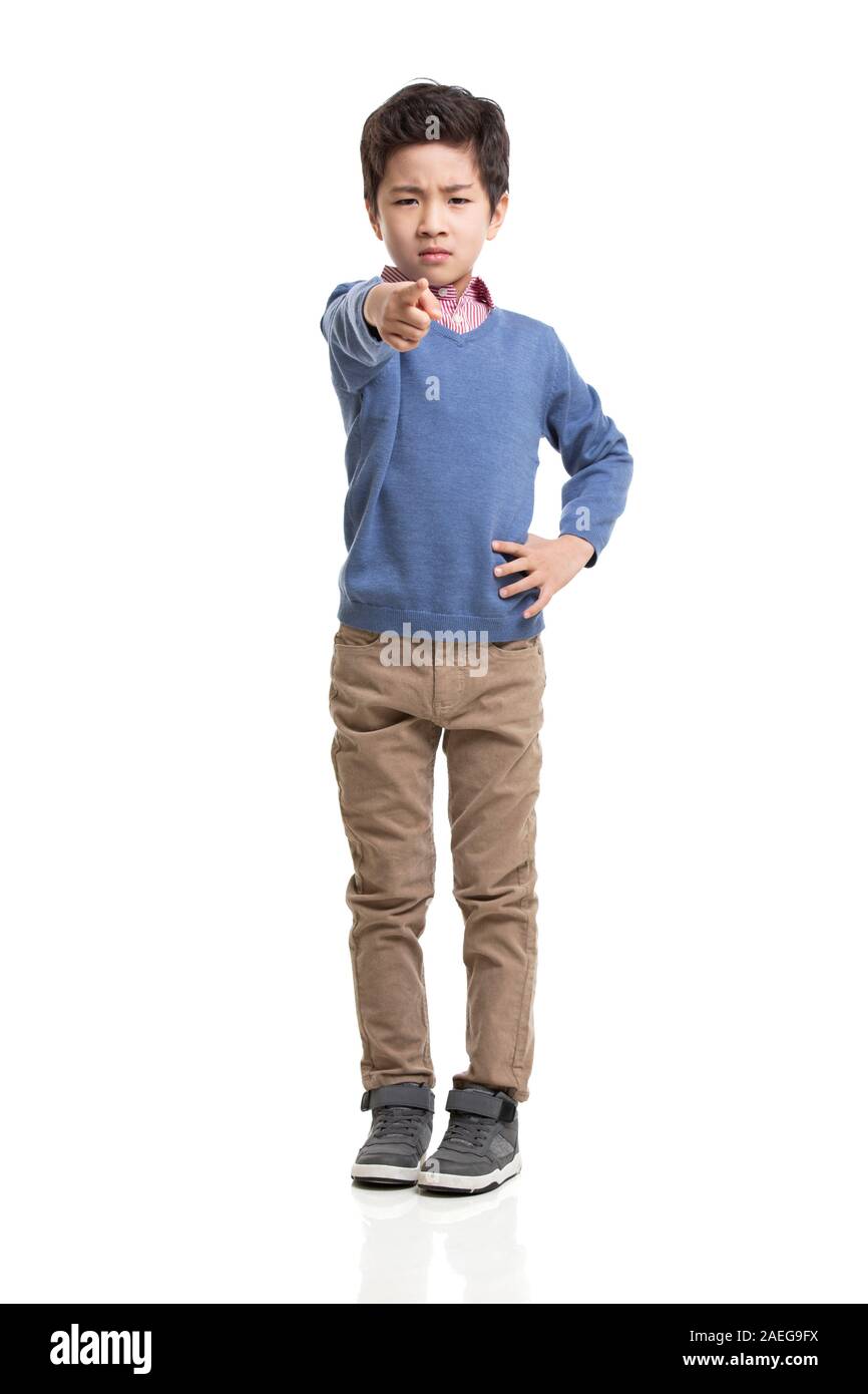 Angry little boy pointing Stock Photo - Alamy