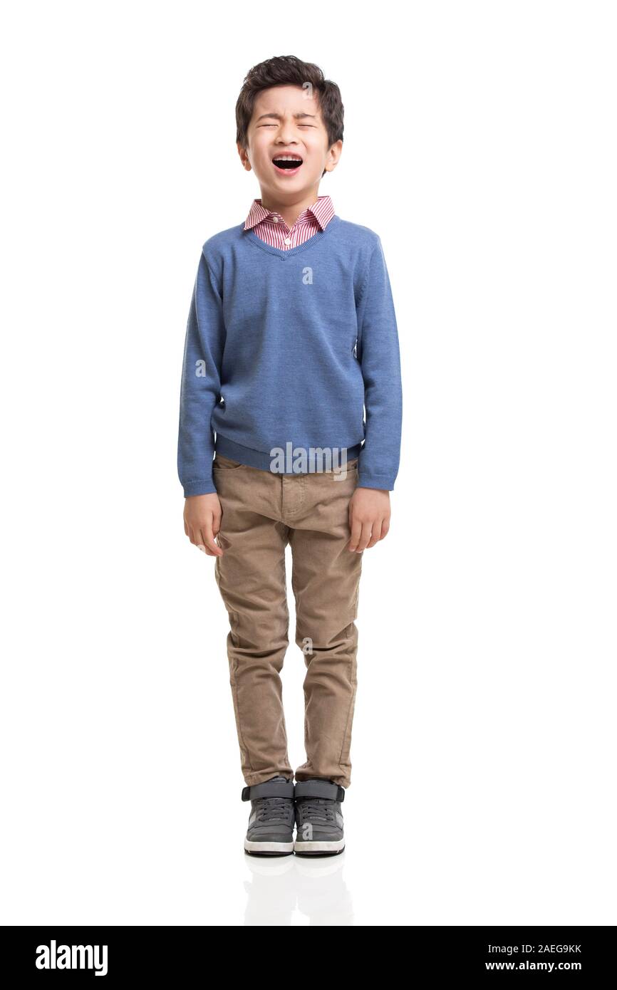 Crying childhood looking away standing sadness hi-res stock photography ...