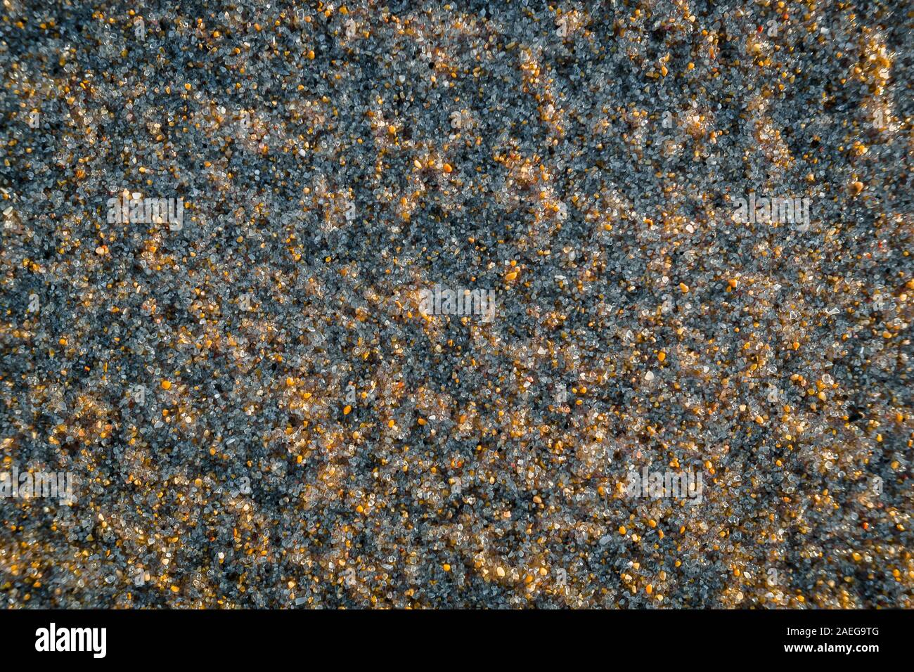 Macro of beach sand, to use as a natural background of rough pebbles ...