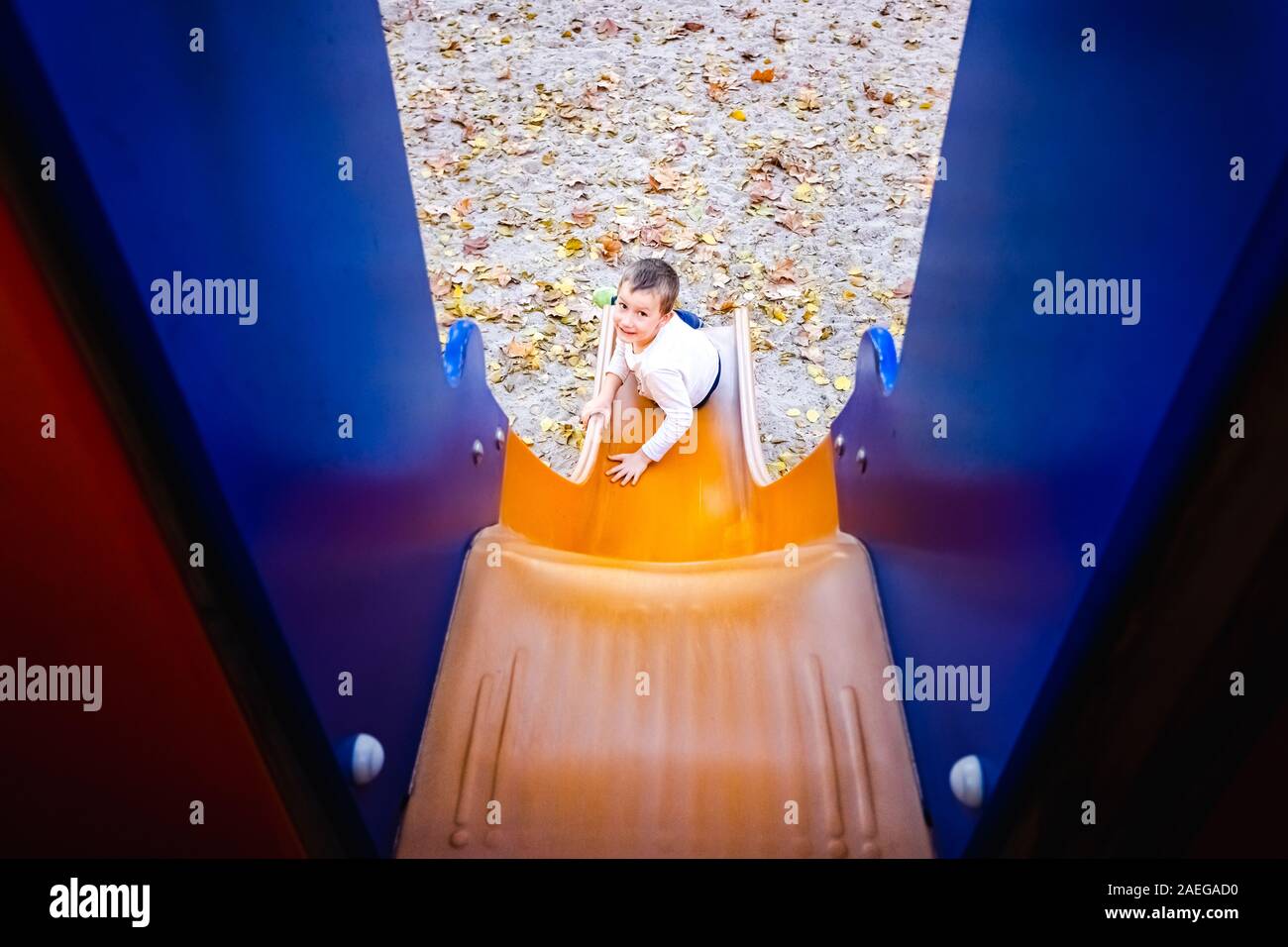 Going down the slide hi-res stock photography and images - Alamy